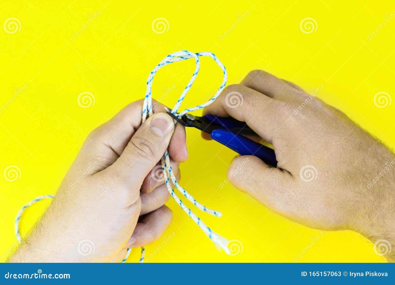 Man snacks a cable nippers stock image. Image of electrical - 165157063