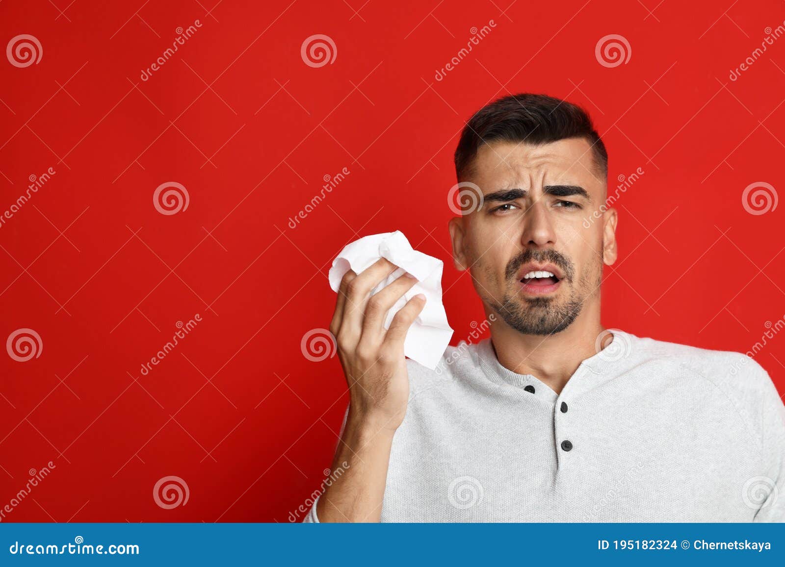 Man Sneezing on Background, Space for Text. Cold Symptoms Stock Photo ...