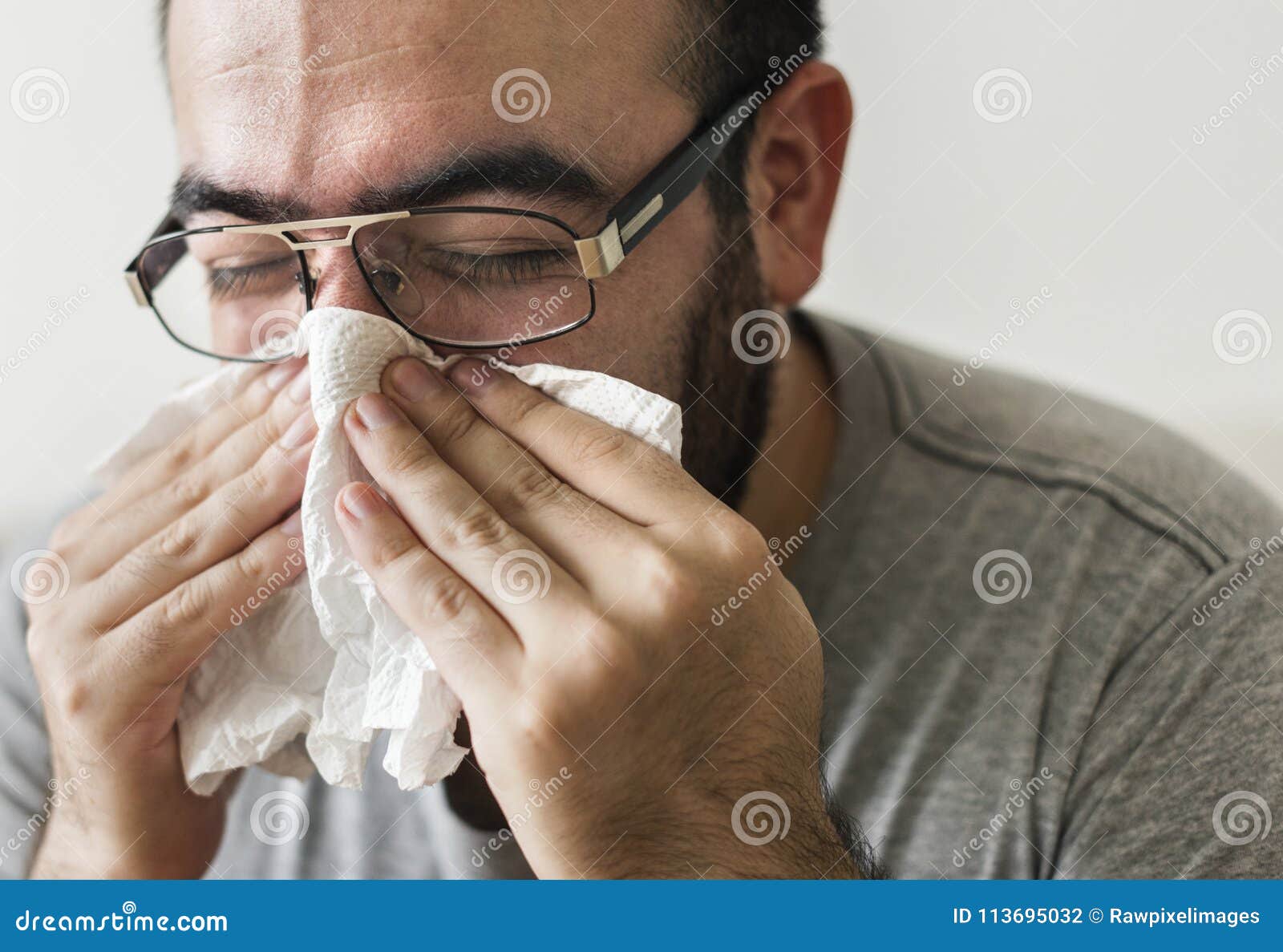 Man Sneezing into Tissue Paper Stock Photo - Image of european, rest ...
