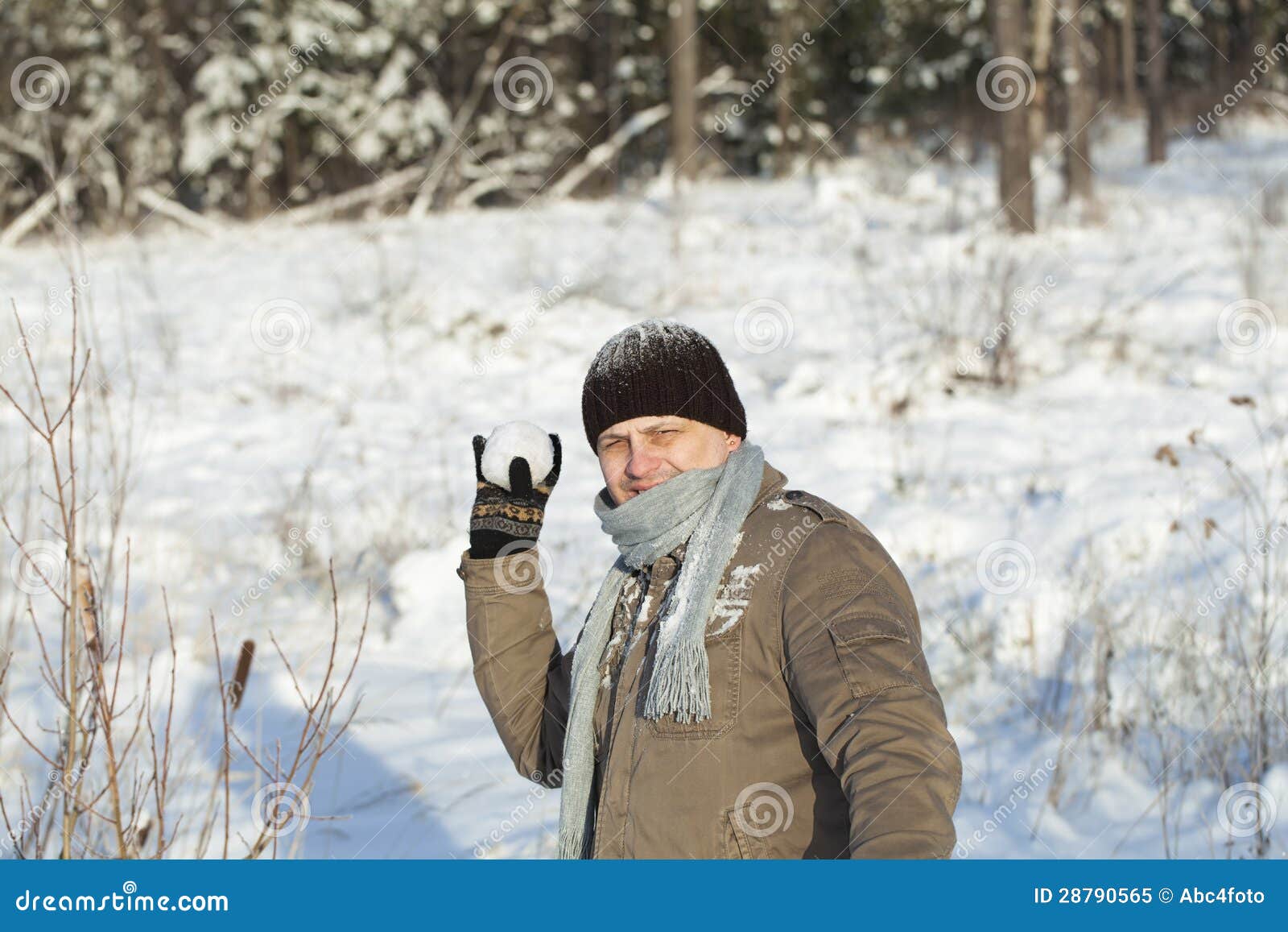 Man with a snowball stock image. Image of outdoors, january - 28790565