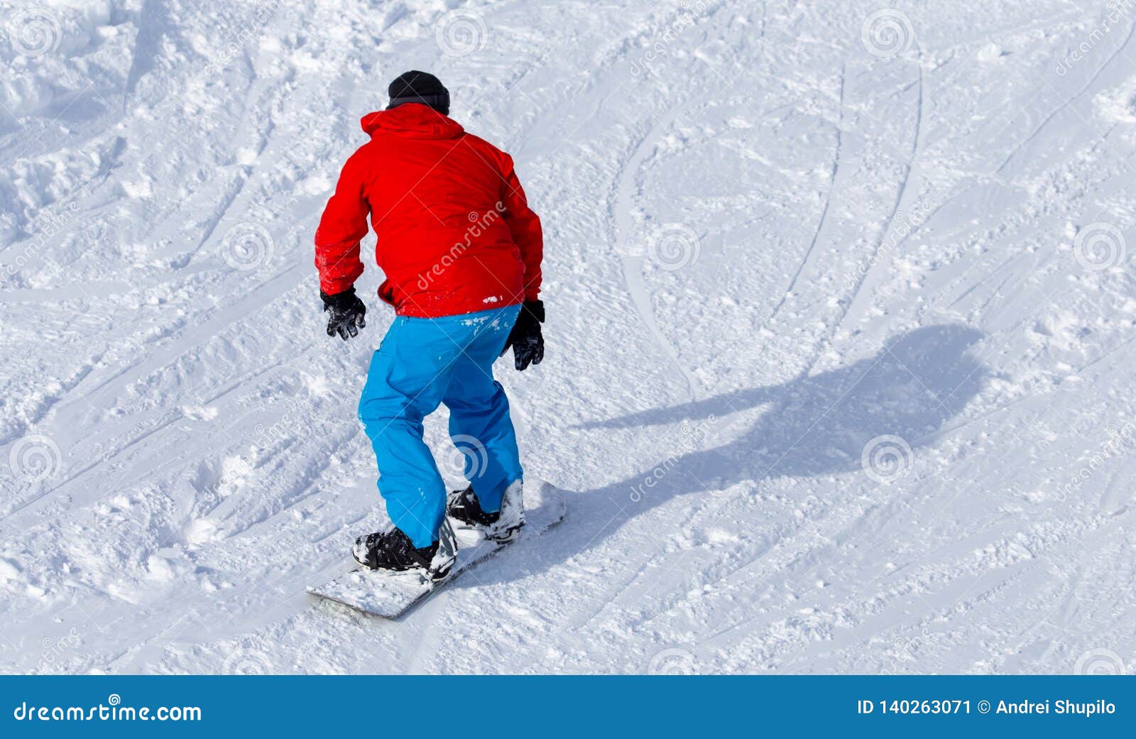 A Man Snowboarding a Mountain in the Snow in Winter Stock Image - Image ...