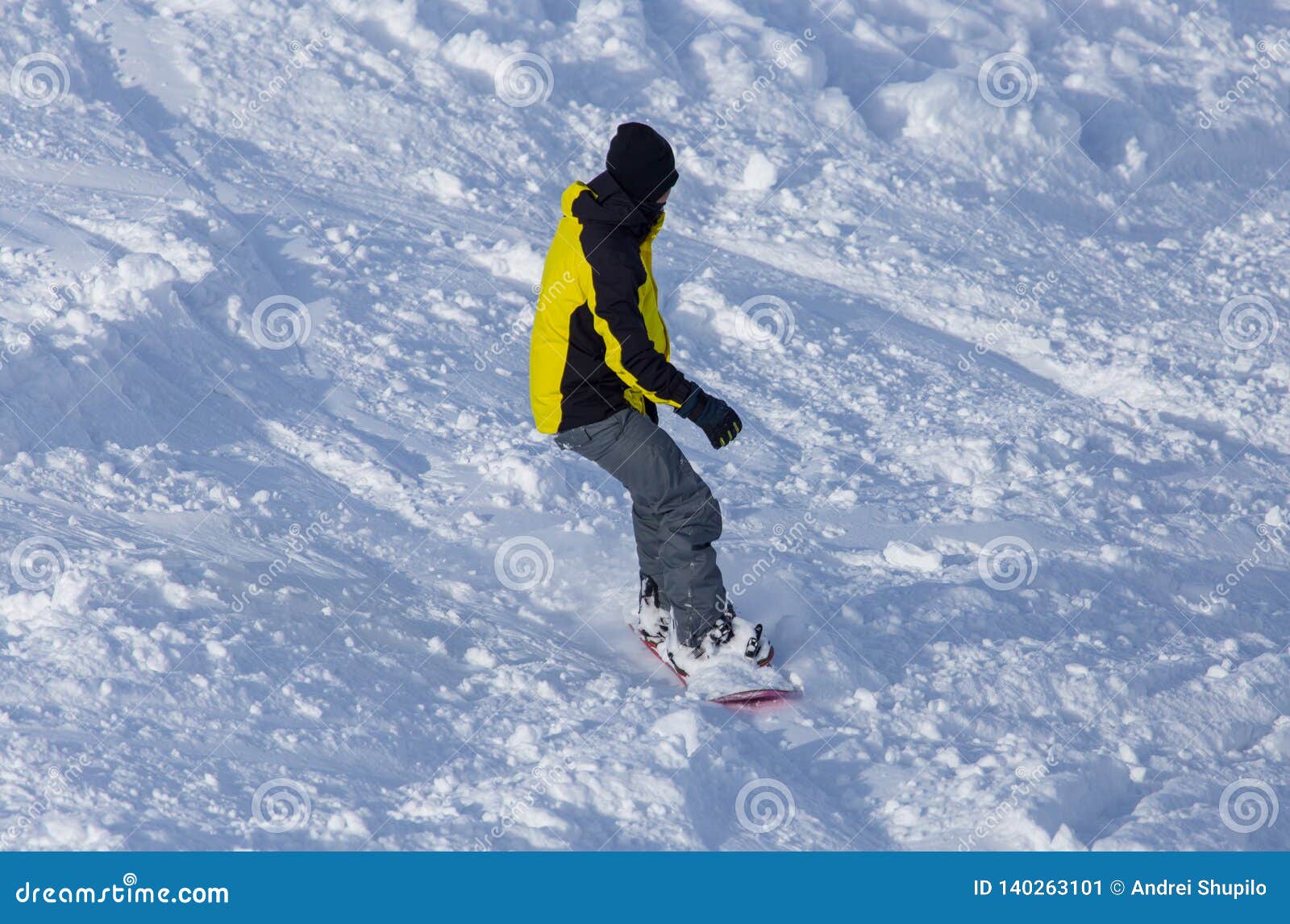 A Man Snowboarding a Mountain in the Snow in Winter Stock Image - Image ...