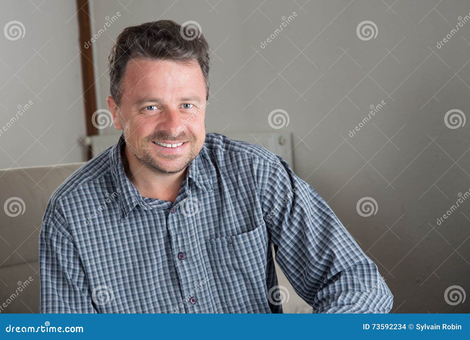 Man on the Sofa at Home Relaxing Stock Photo - Image of relaxing ...