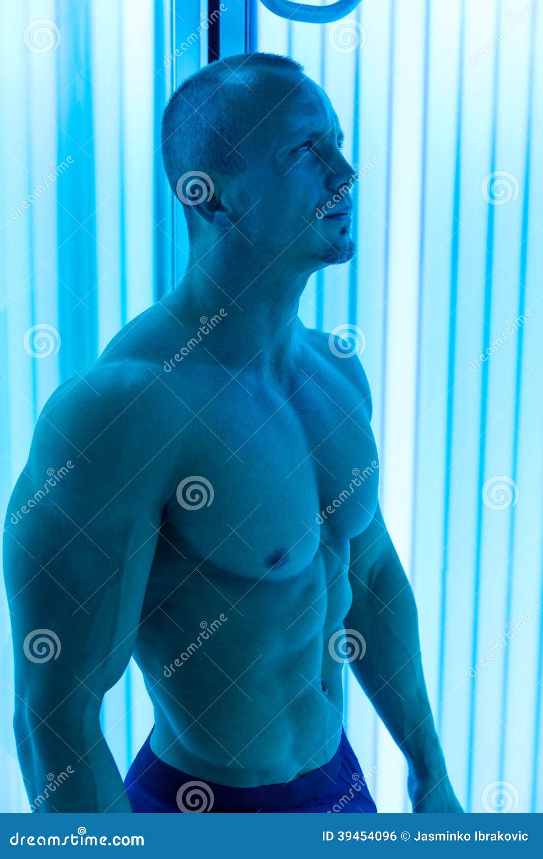 Man in Solarium stock photo. Image of skin, bulb, adult - 39454096