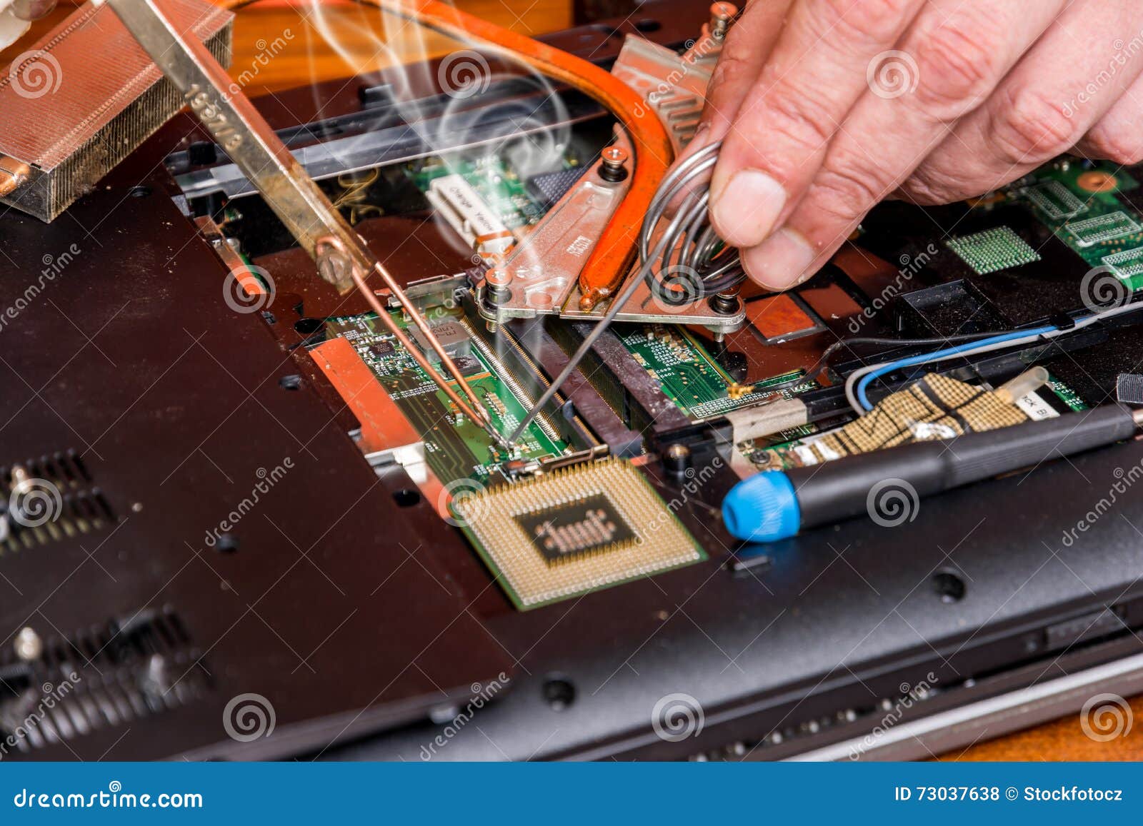 Man soldering computer stock photo. Image of service - 73037638