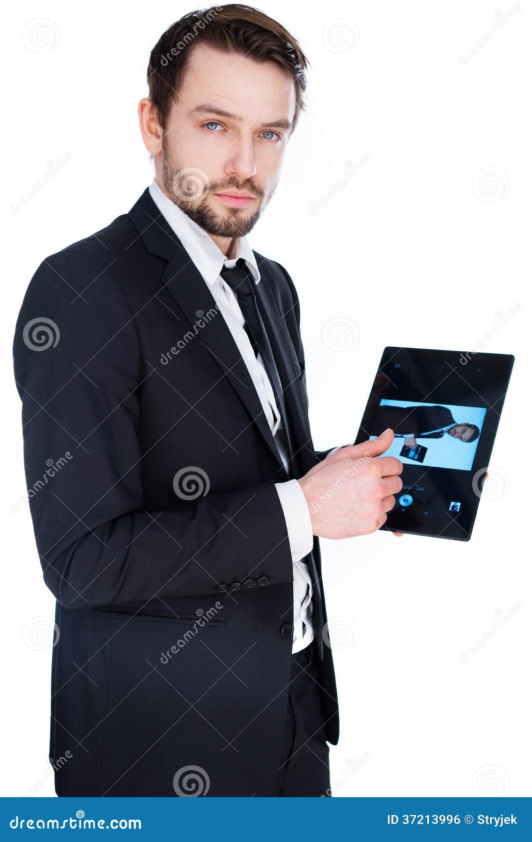 Man Som Visar En Handheld Minnestavladator Arkivfoto - Bild av ...