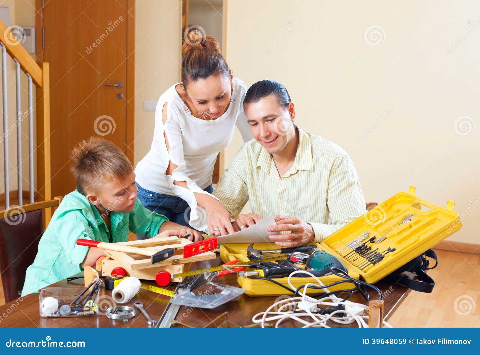Man with Son Doing Something with Working Tools Stock Image - Image of ...