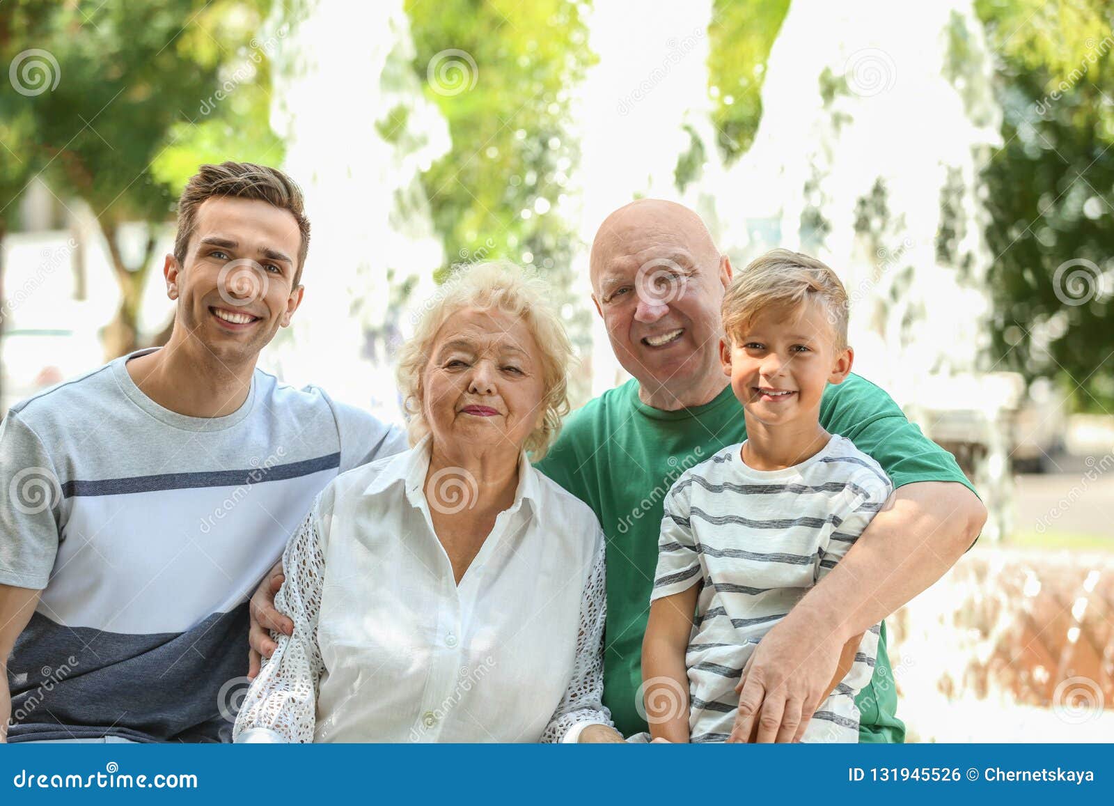 Man with Son and Elderly Parents Stock Photo - Image of pensioner ...