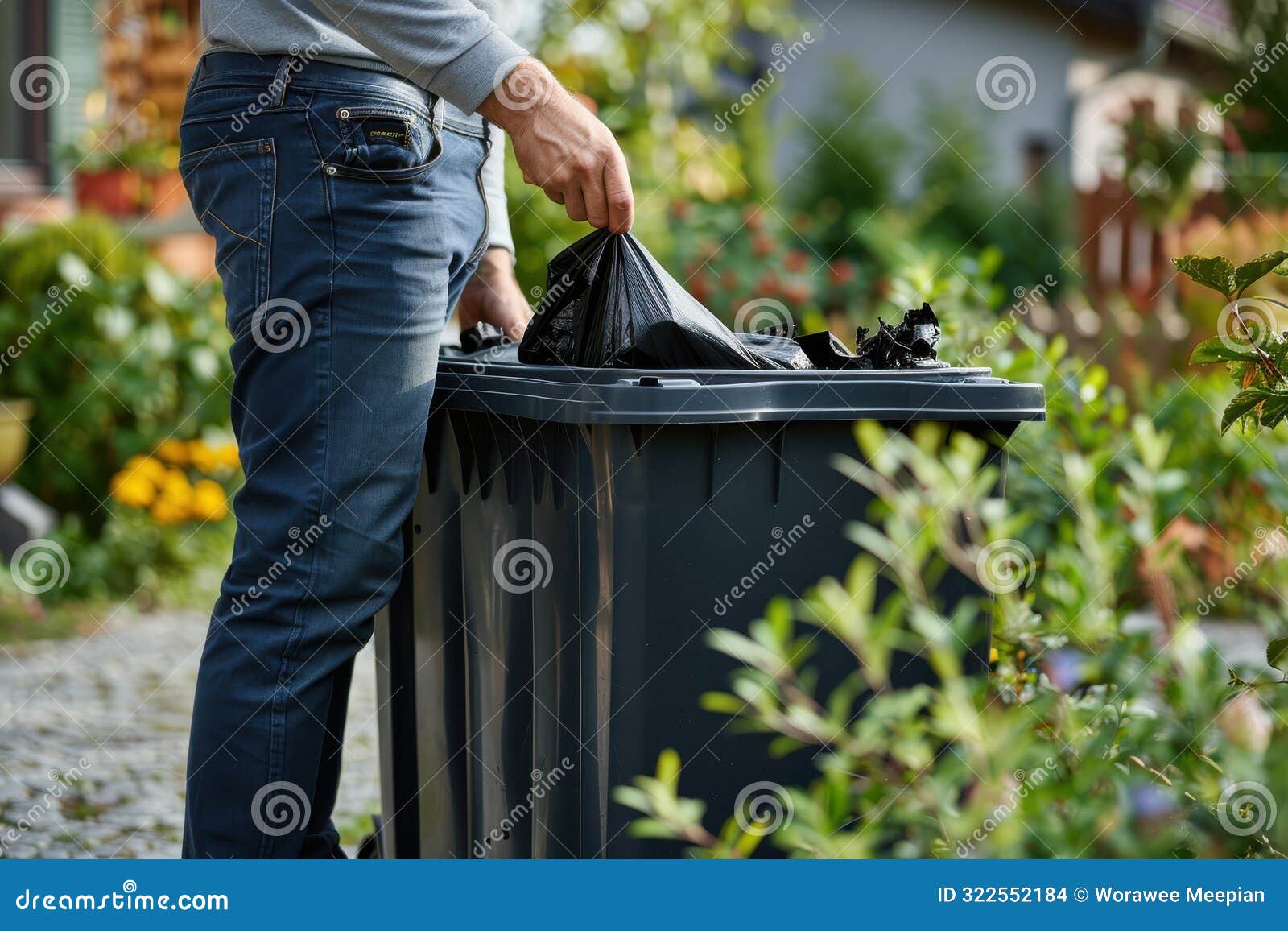 Man Sorting Garbage. Recycling and Environmental Concept Stock Photo ...