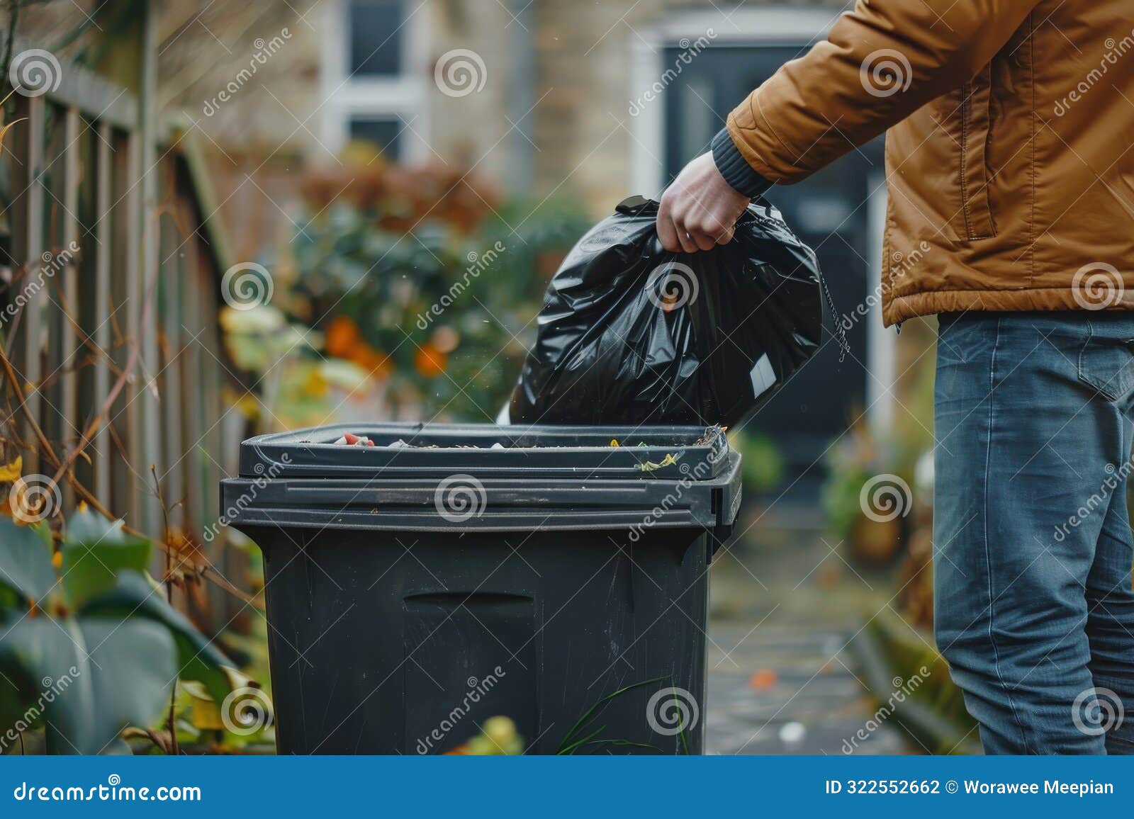 Man Sorting Garbage. Recycling and Environmental Concept Stock Photo ...