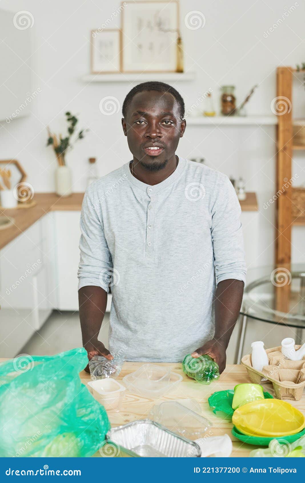Man Sorting Plastic at Home Stock Photo - Image of cooking, indoors ...