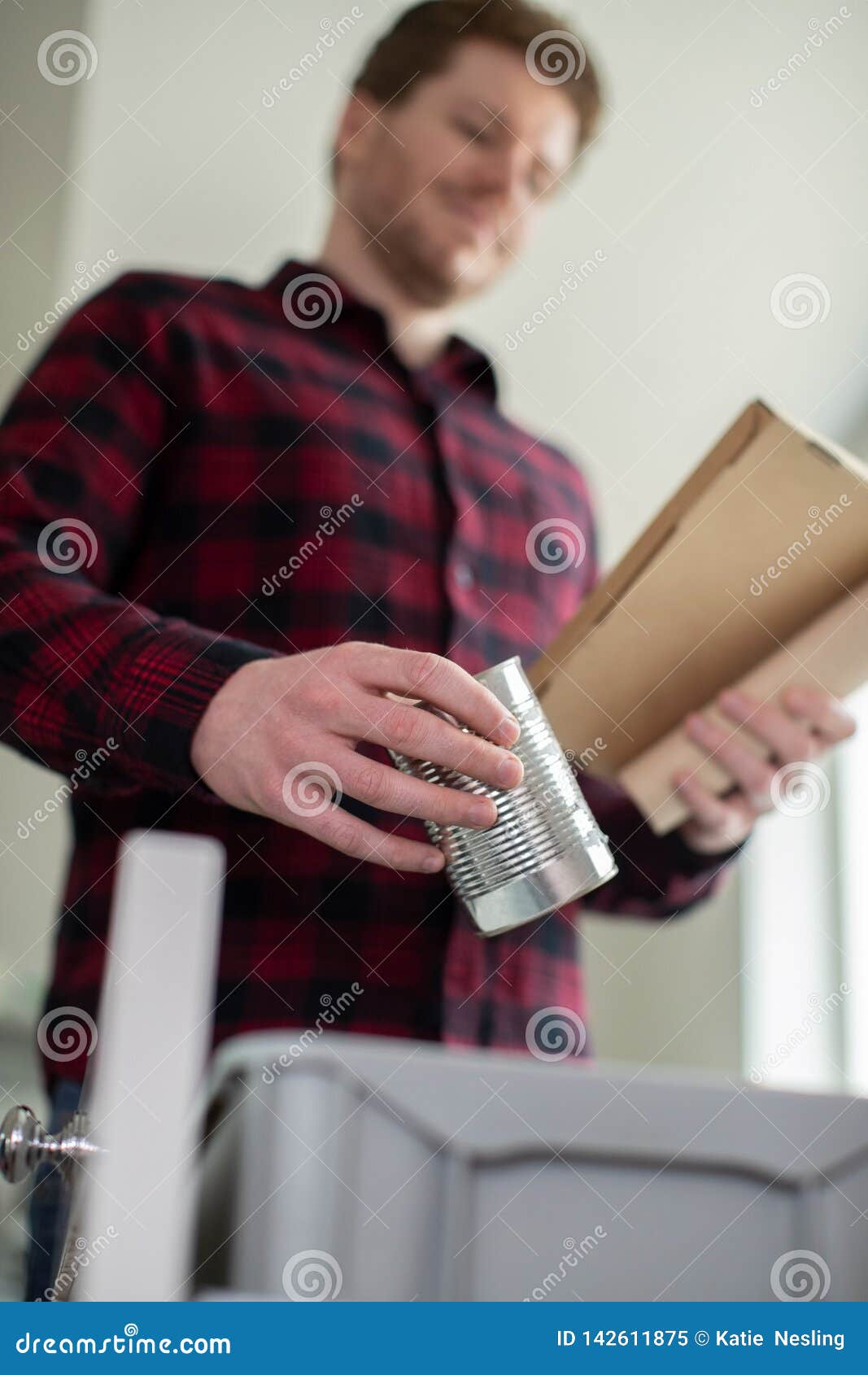 Man Sorting Recycling into Kitchen Bin at Home Stock Image - Image of ...