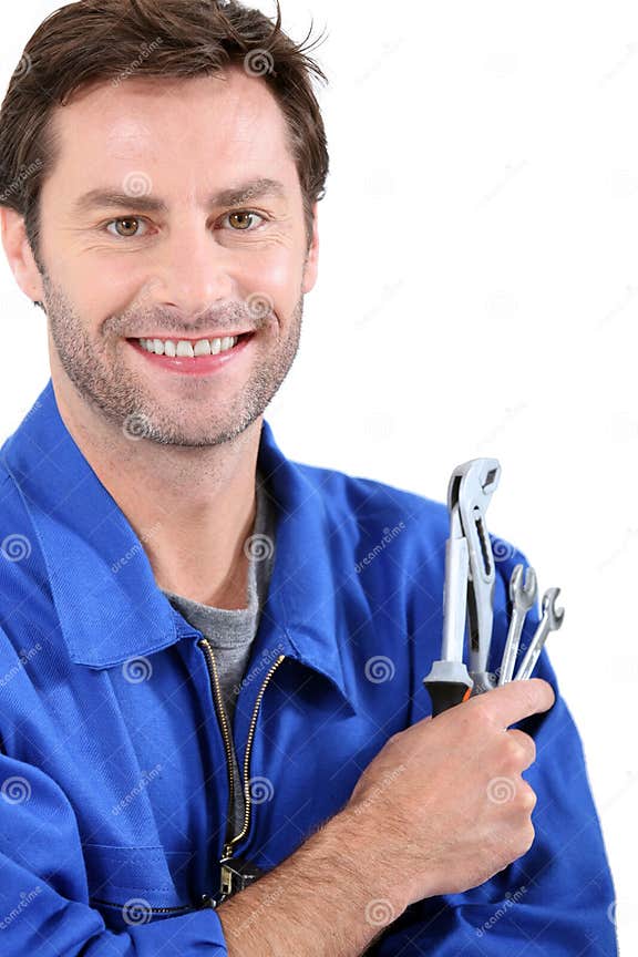 Man with spanners stock image. Image of repairman, mechanic - 24230633