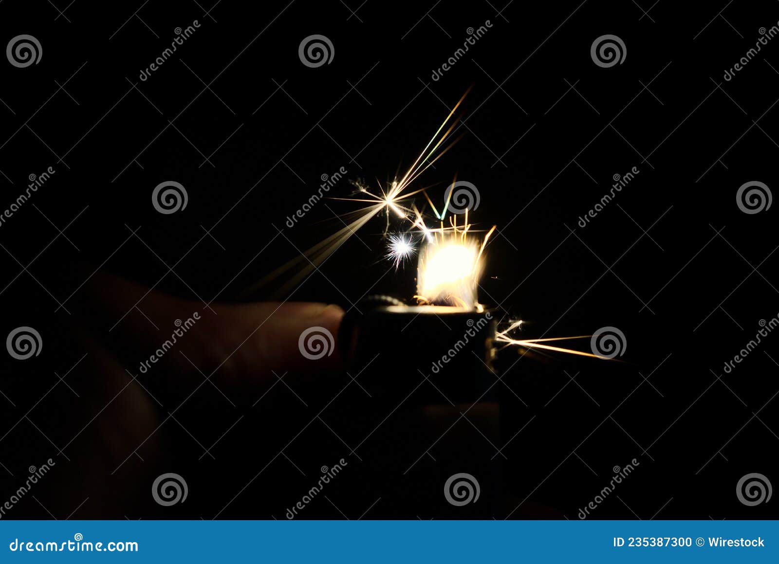 Man Sparking a Lighter stock photo. Image of macro, smoke - 235387300