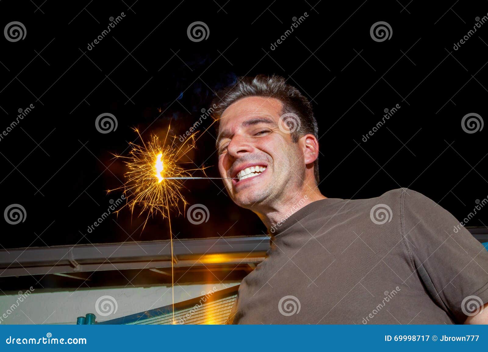 Man with Sparkler between His Teeth Stock Image - Image of happy ...