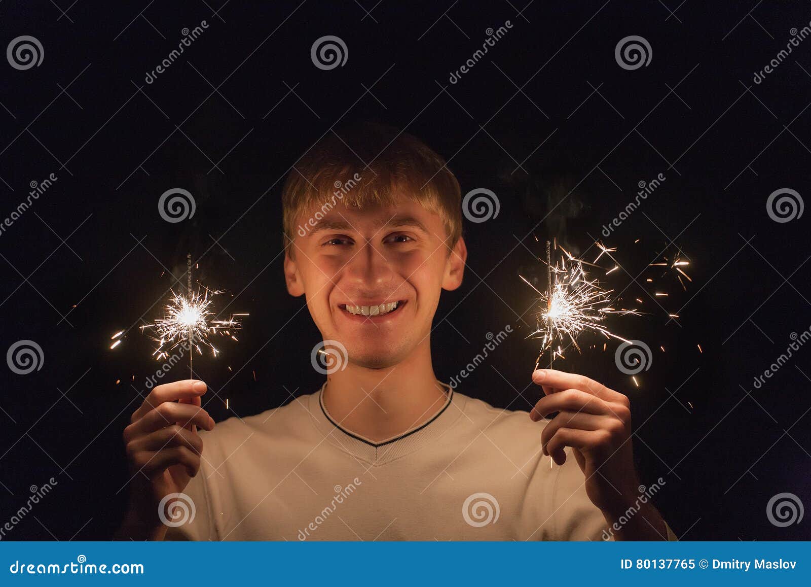 Man with sparklers stock image. Image of dark, fire, smiling - 80137765