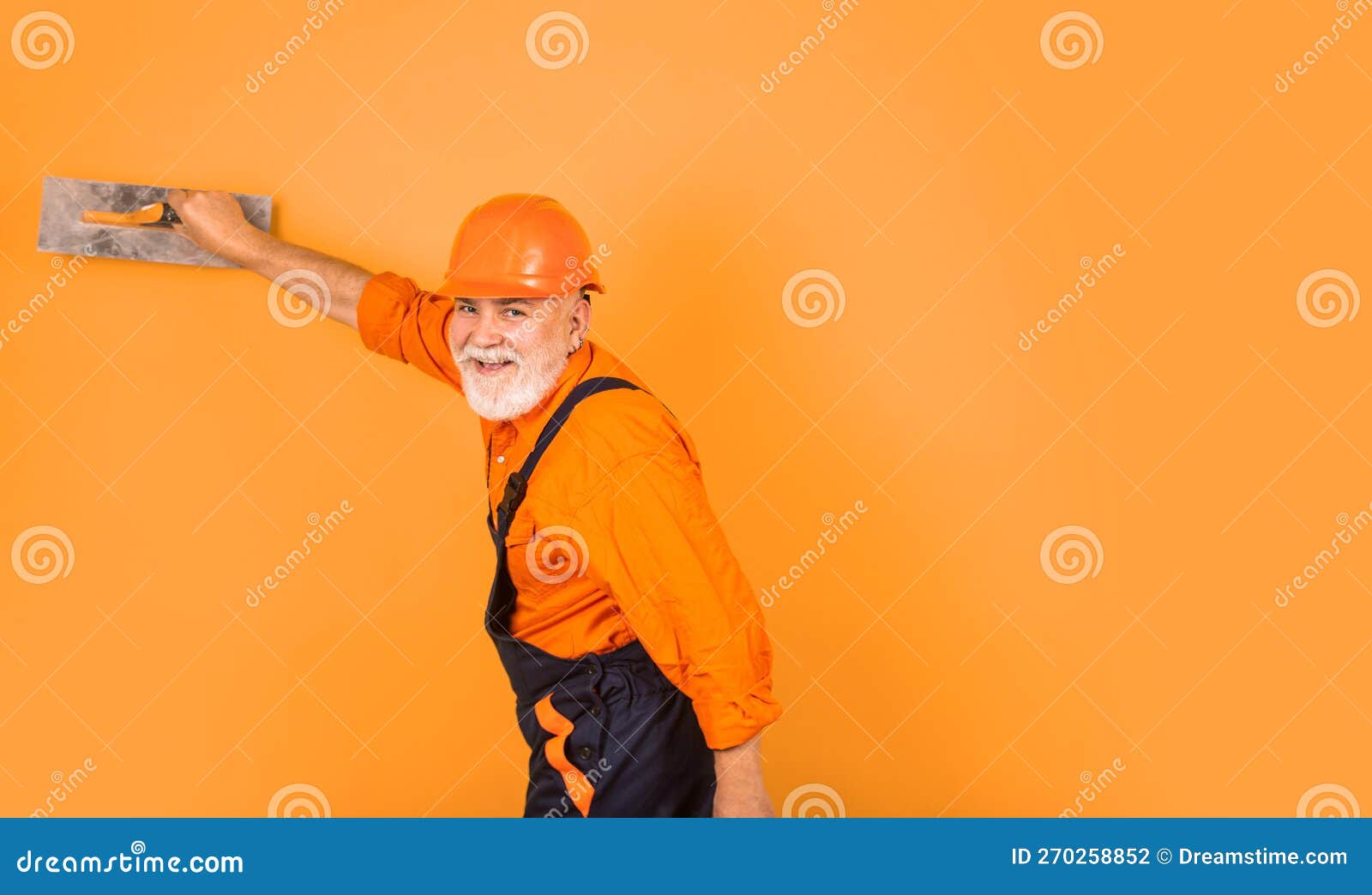 Man with Spatula. Process of Applying Layer of Putty. Plastering Tools ...