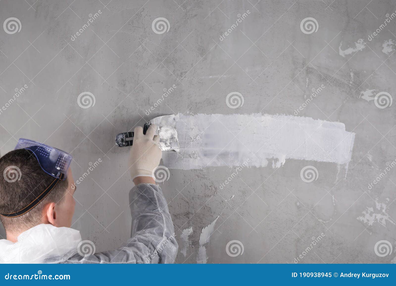 Plastering Work On The Foam-insulated Facade Of A New Private House ...