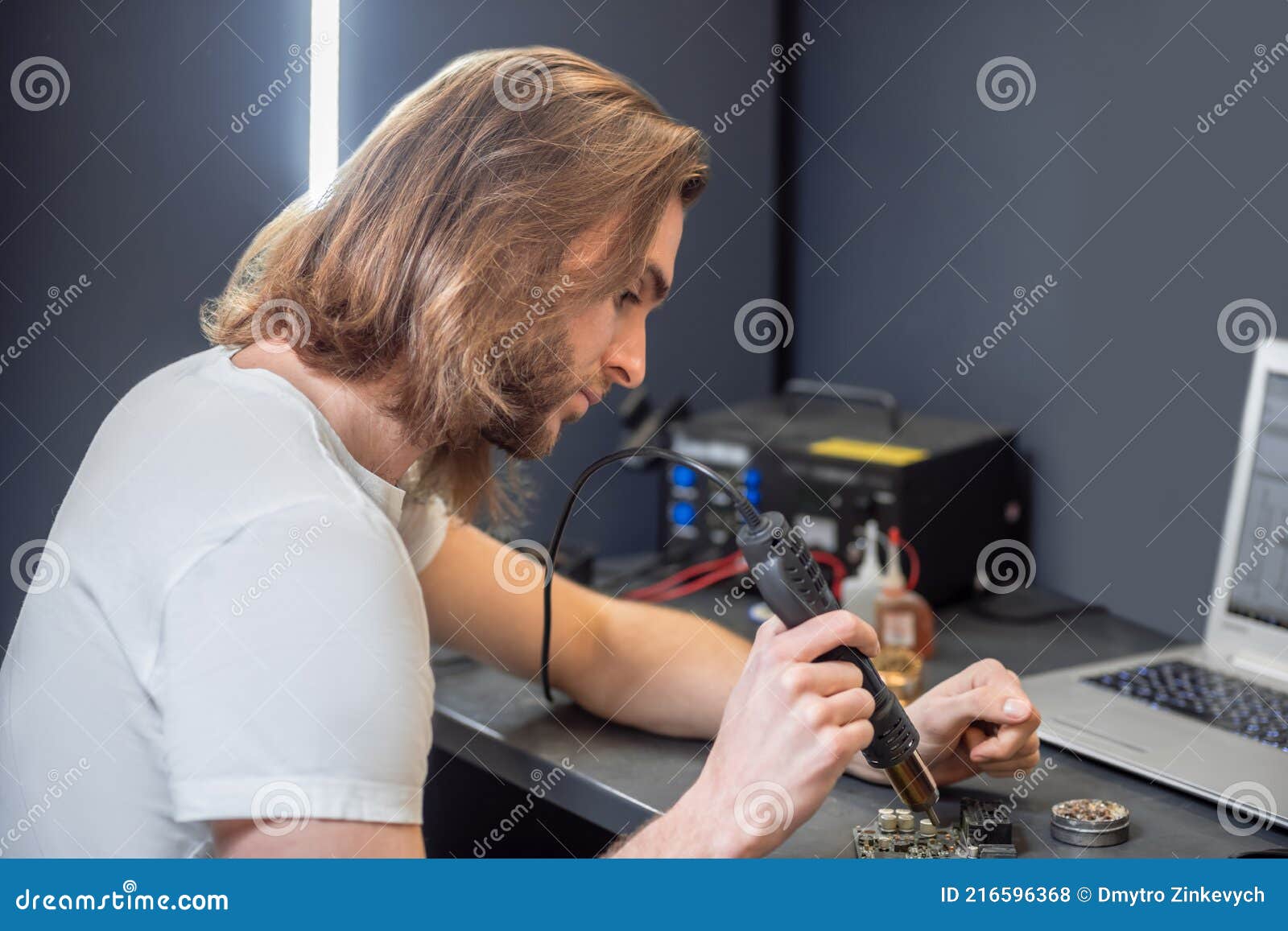 Man with Special Device and Microcircuit Stock Photo - Image of repair ...