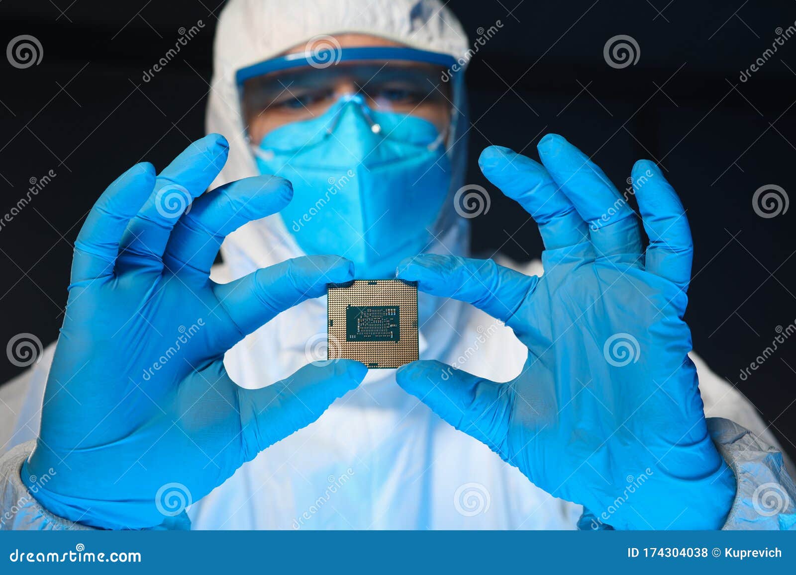 Man in Special Uniform Shows Microprocessor Chip Stock Photo - Image of ...