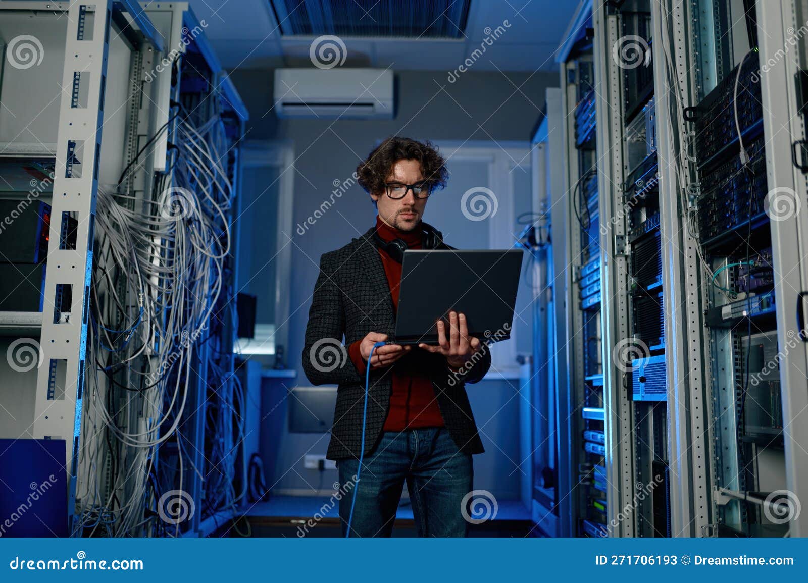 Man it Specialist with Laptop Working on Datacenter Software Update ...