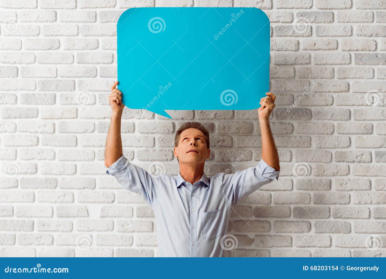 Man with speech bubbles stock photo. Image of elegant - 68203154