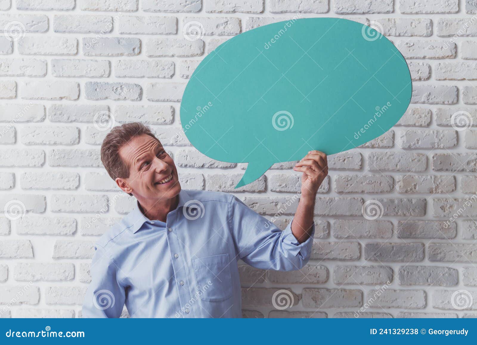 Man with speech bubbles stock photo. Image of lifestyle - 241329238