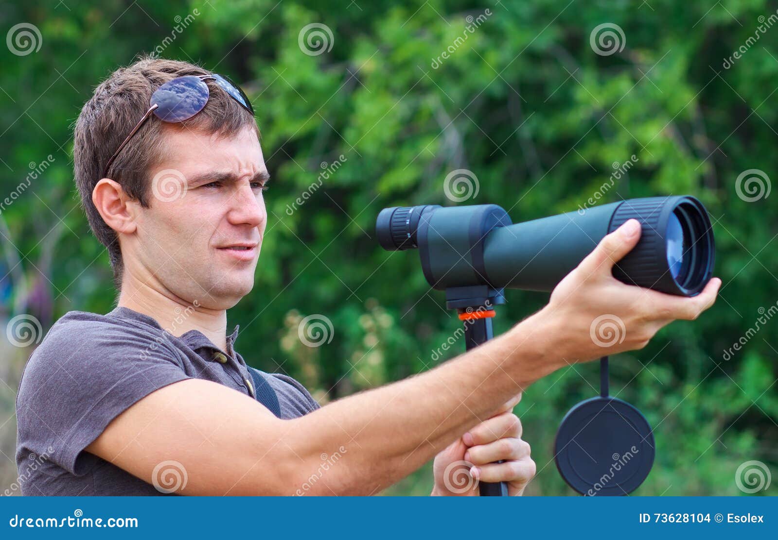 Man with Spotting Scope Looks at the Target. Stock Photo - Image of ...