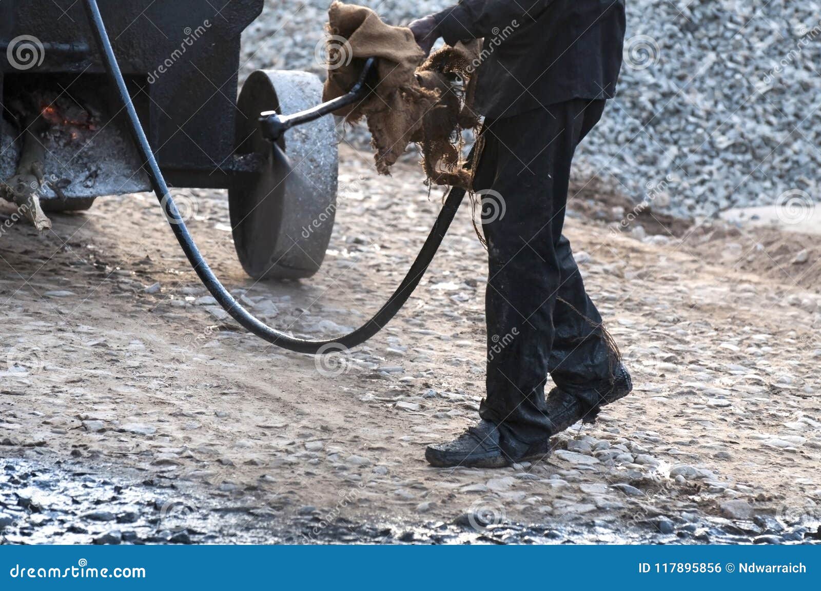A Man is Spraying the Bitumen Stock Photo - Image of construction ...
