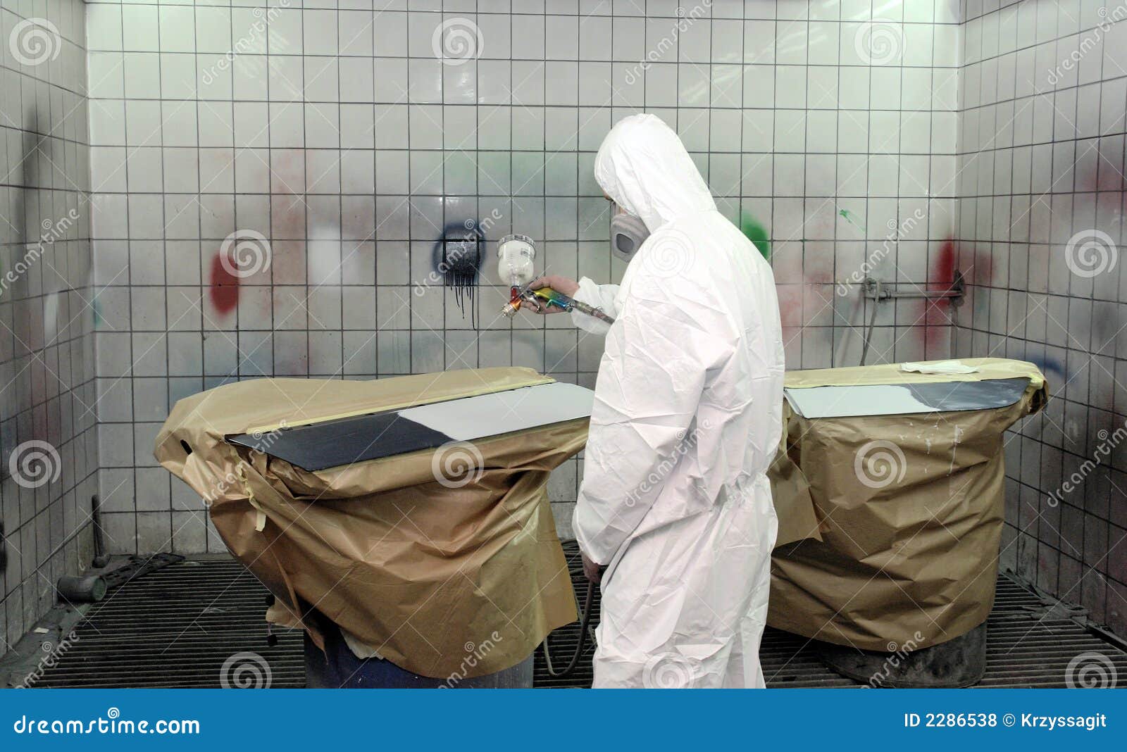 Man Spraying Paint stock photo. Image of paint, sprayer - 2286538
