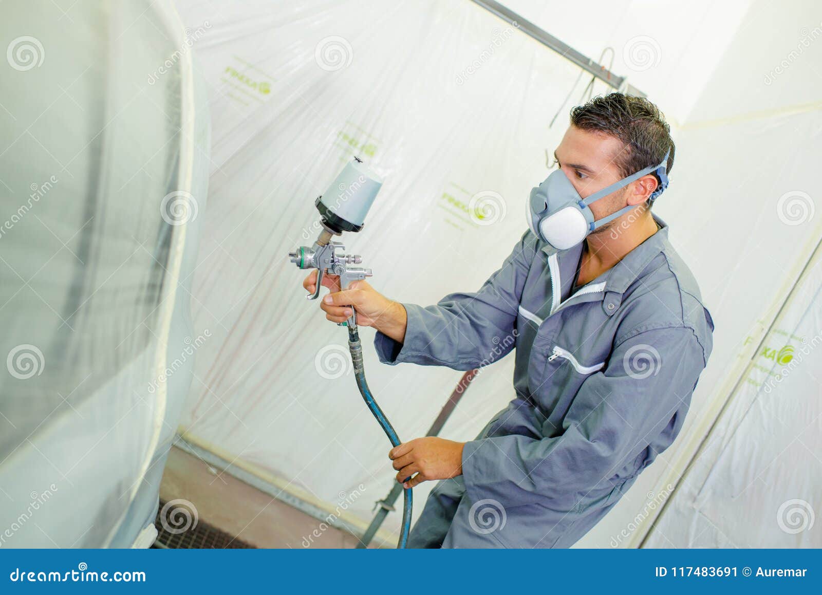 Man Spraying Paint with Air Tool Stock Image - Image of worker ...