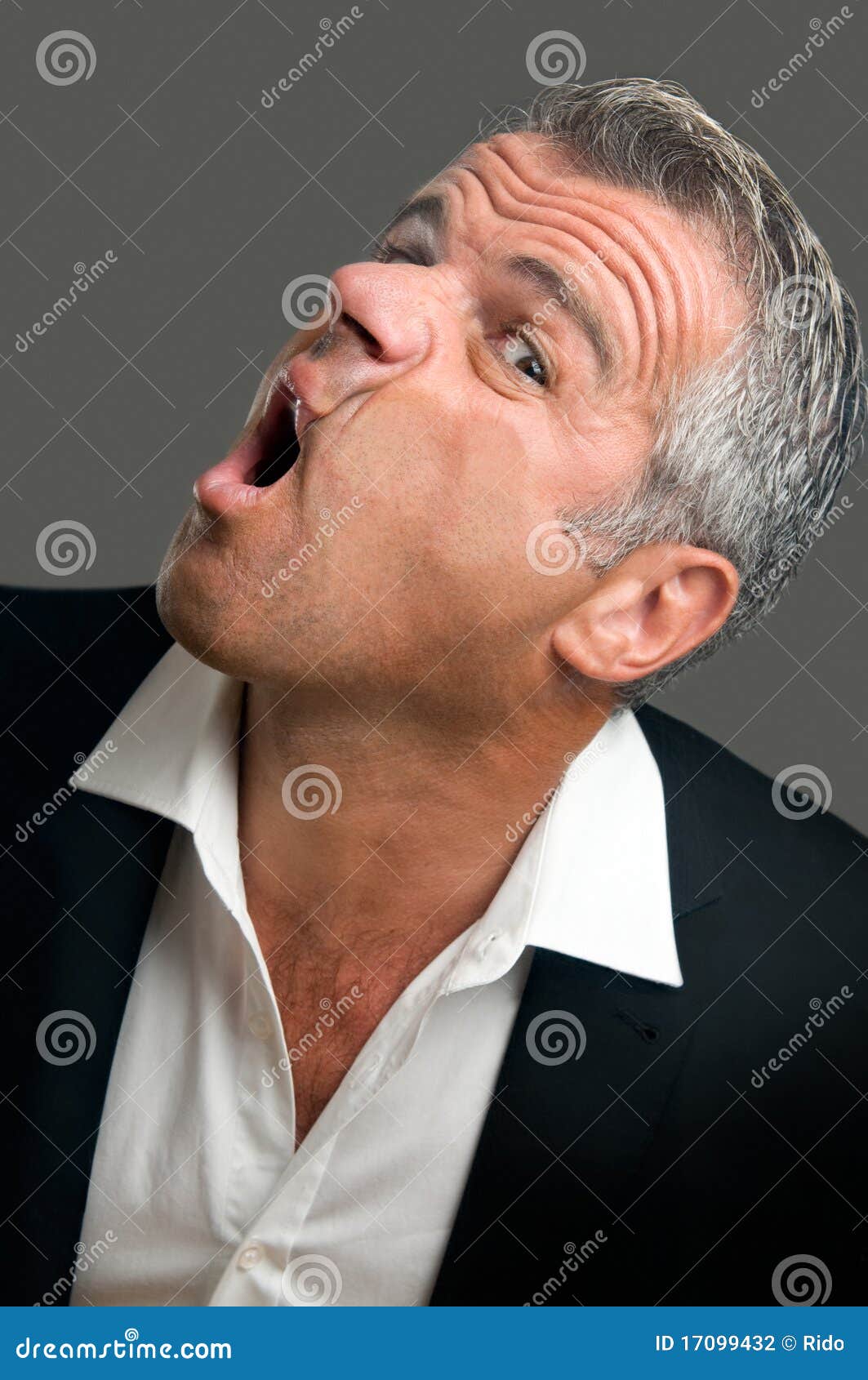 Man Squeezed Behind Glass Window Stock Photo - Image of suit, people ...