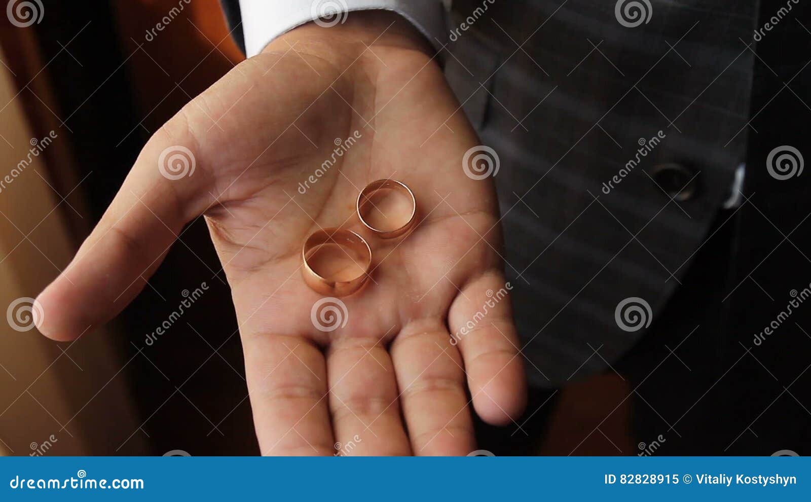 A Man Squeezes Two Wedding Rings in a Hand a Fist Stock Video - Video ...