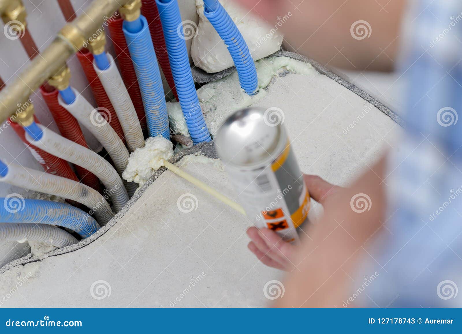 Man Squirting Expanding Foam Around Pipes Stock Image - Image of ... Man Squirting Expanding Foam Around Pipes Stock Image - Image of ...