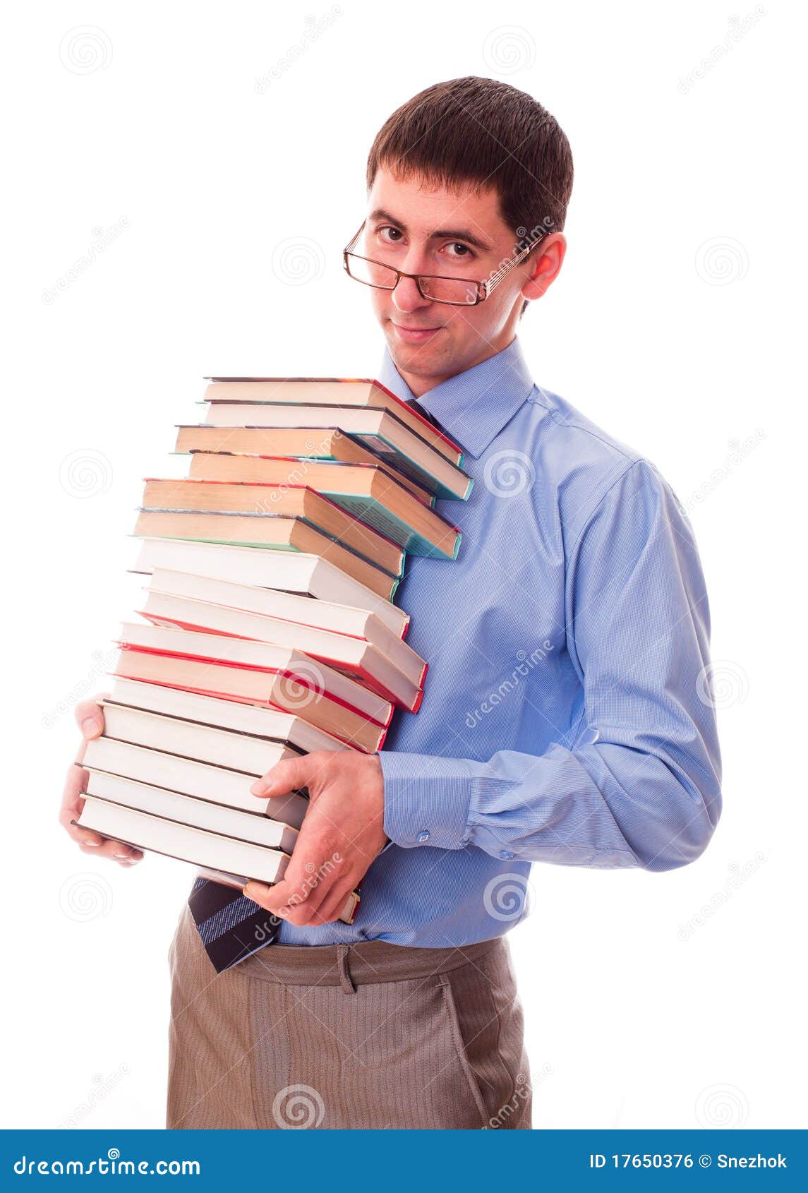 Man with stack of books stock photo. Image of black, neck - 17650376