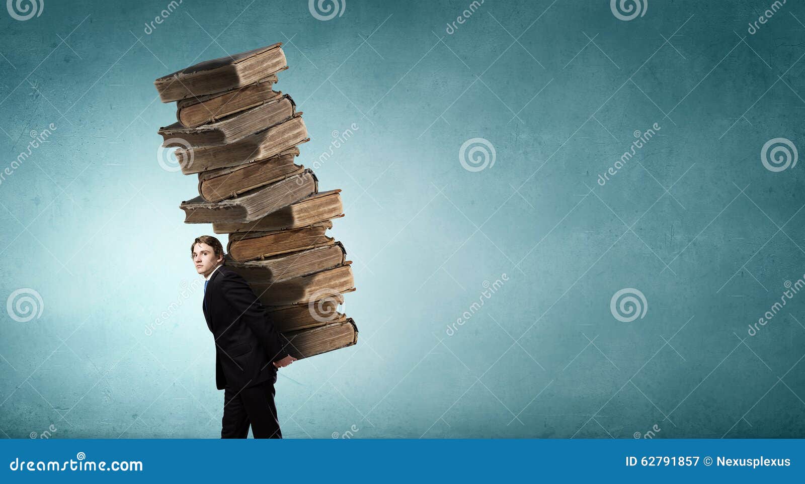 Man with Stack of Books in Hands Stock Image - Image of carrying ...