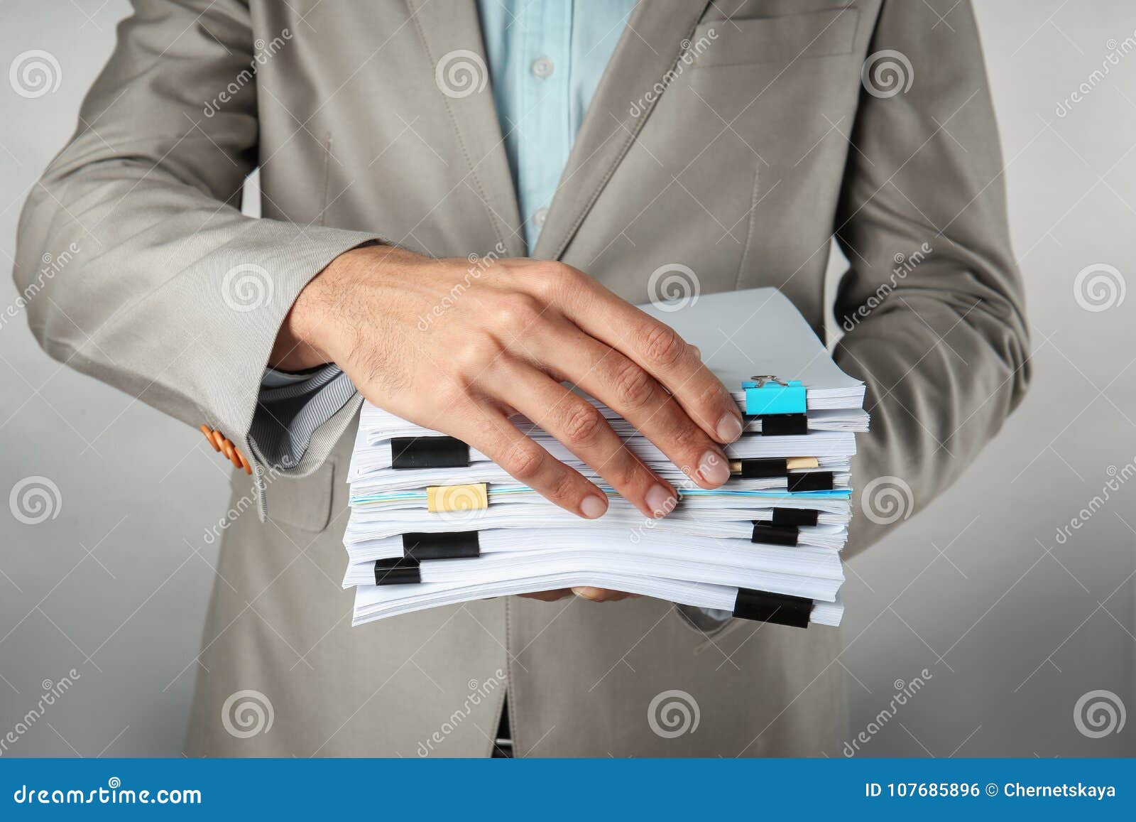 Man with Stack of Documents Stock Photo - Image of group, career: 107685896