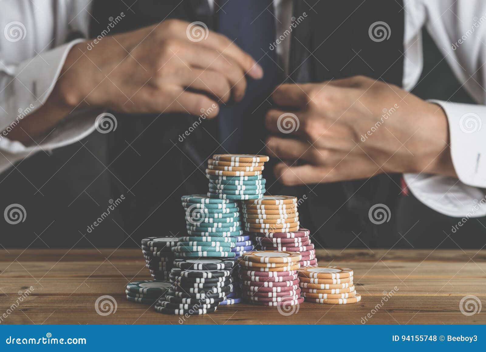 A Man Stacking Chips on a Table Stock Photo - Image of battle, gaming ...