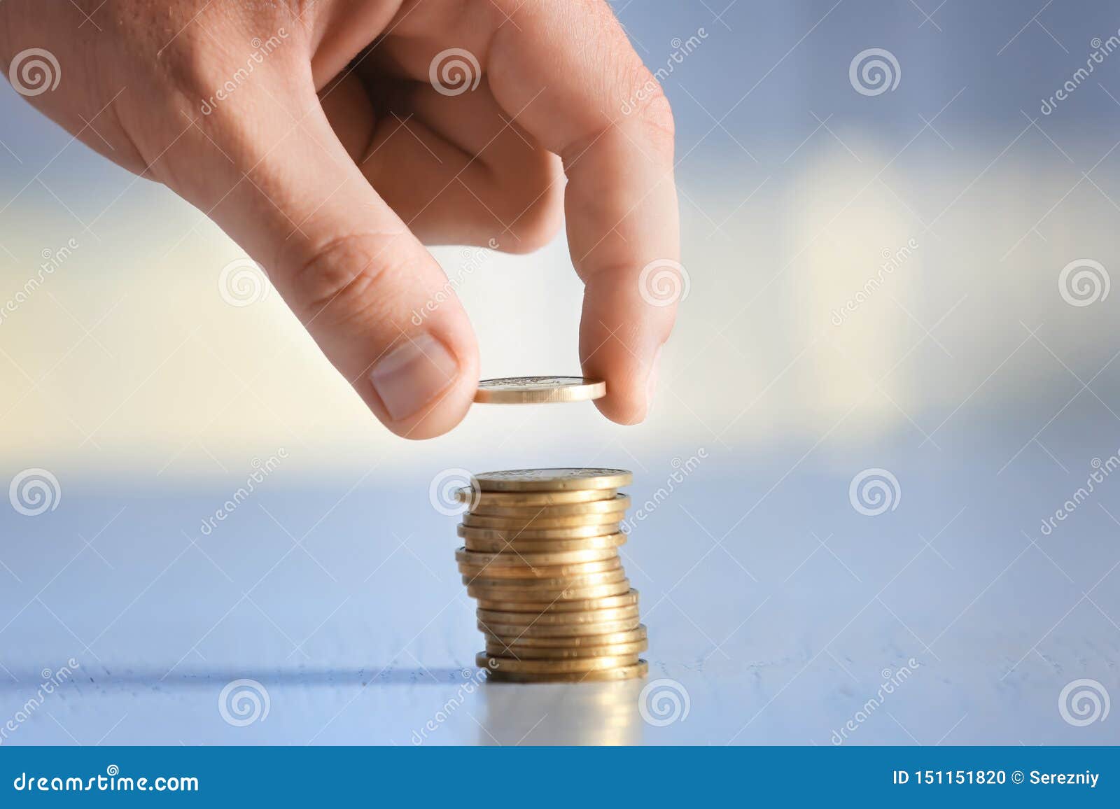 Man Stacking Coins on Table. Savings Concept Stock Photo - Image of ...