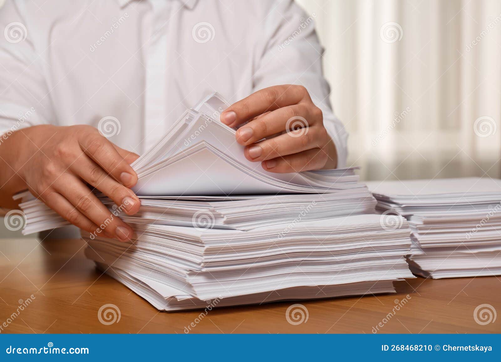 Man Stacking Documents at Table in Office, Closeup Stock Photo - Image ...