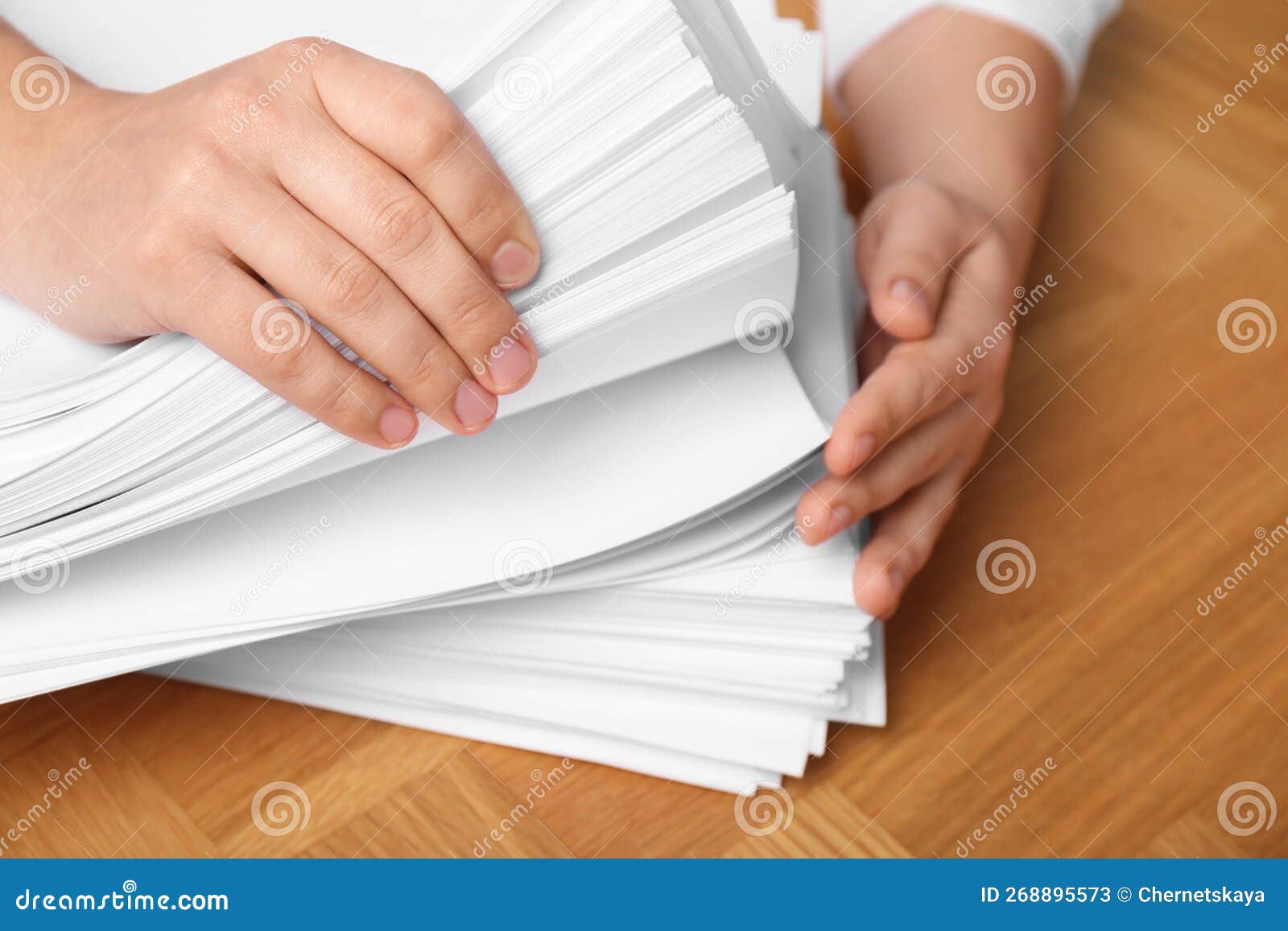 Man Stacking Documents at Wooden Table, Top View Stock Image - Image of ...