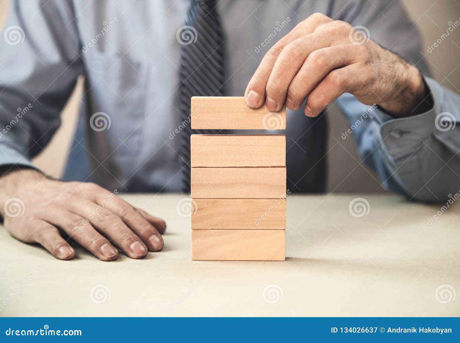 Man Stacking Wooden Blocks. Development Concept Stock Image - Image of ...