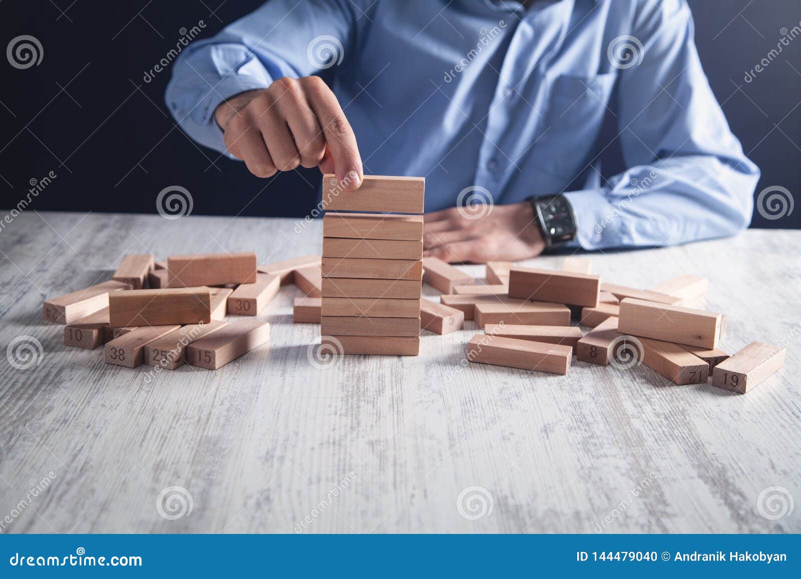 Man Stacking Wooden Blocks. Development Concept Stock Photo - Image of ...
