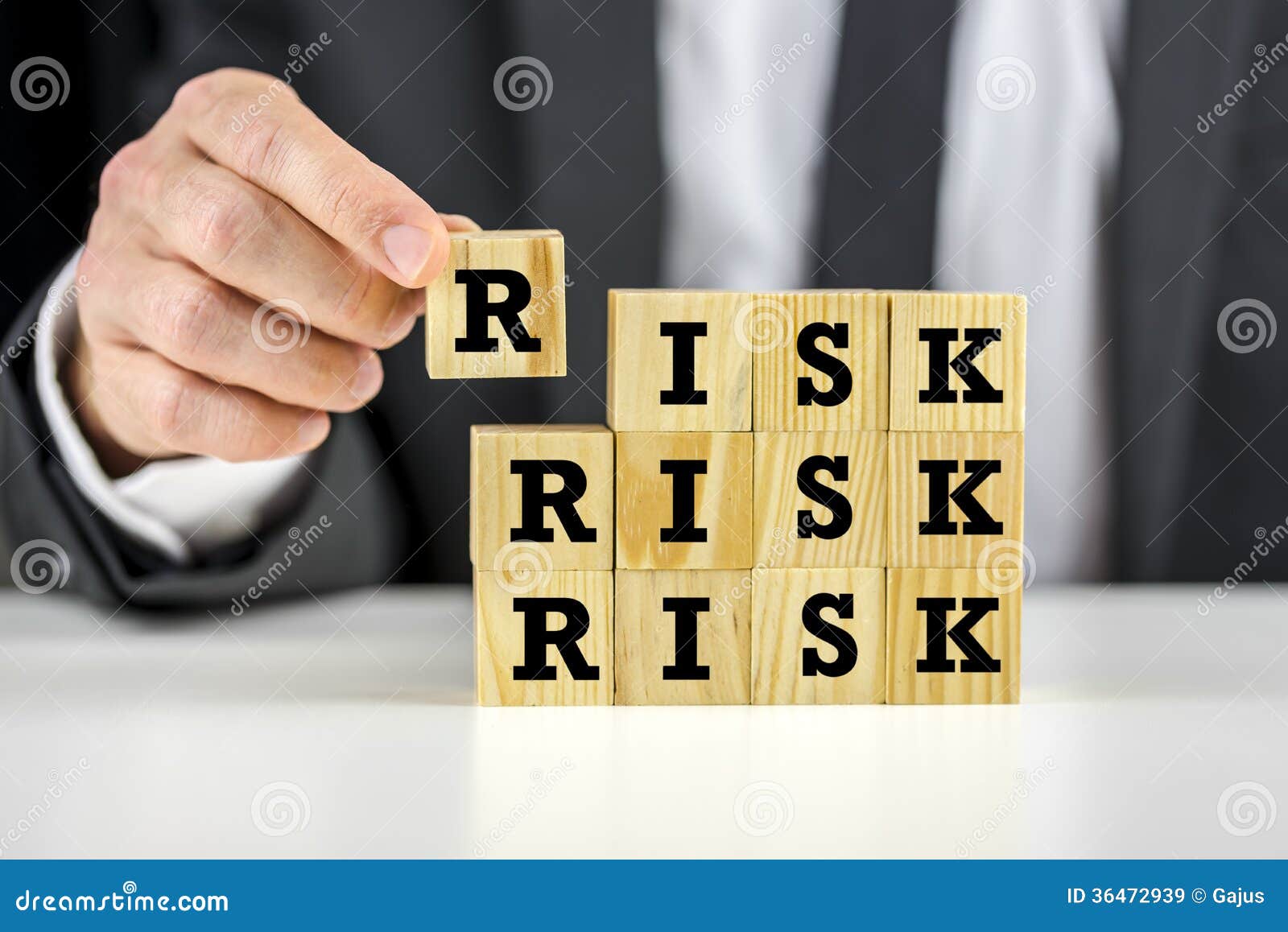 Man Stacking Wooden Risk Blocks Stock Image - Image of caution ...