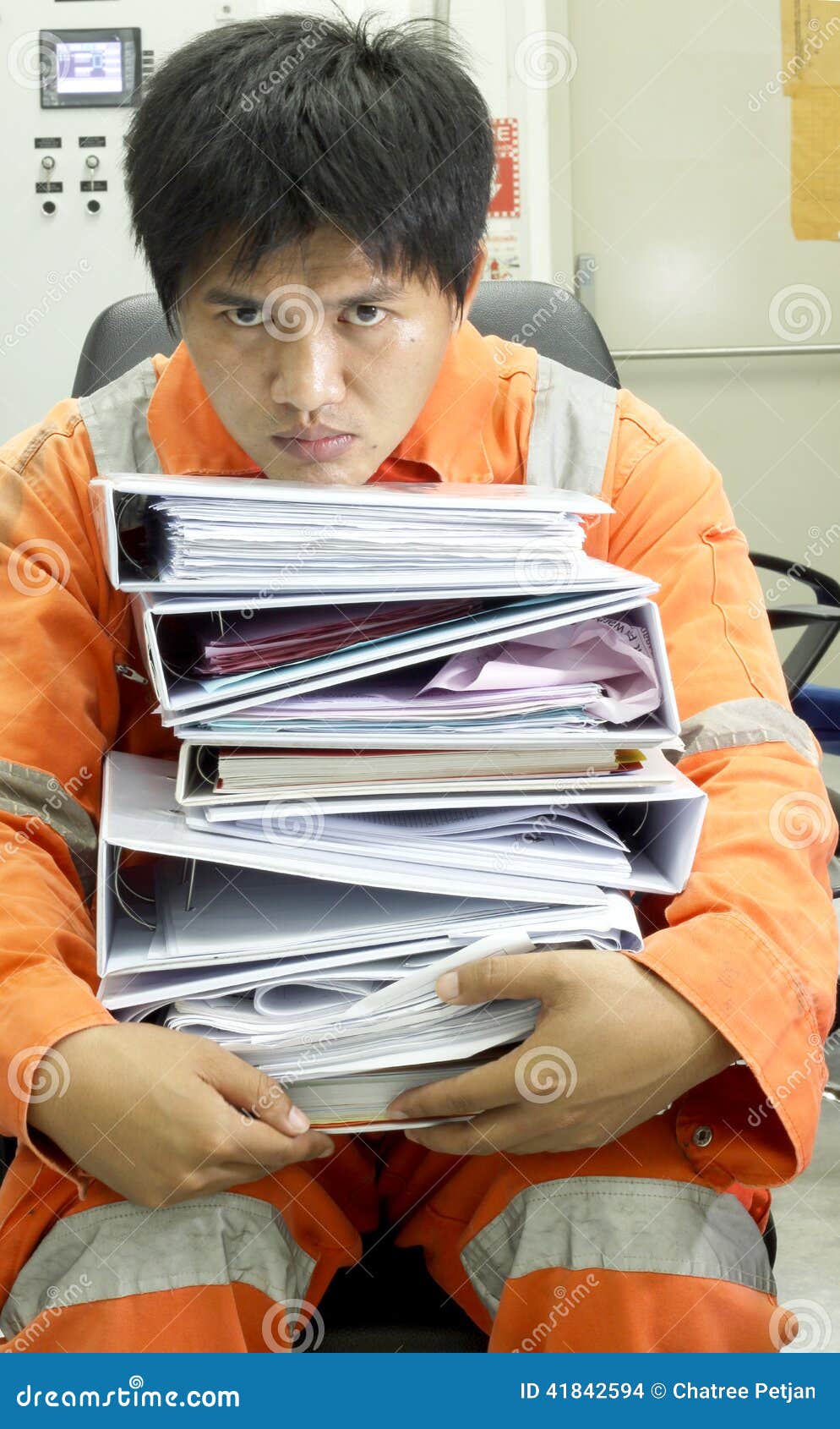 Man in stacks of paperwork stock photo. Image of clerk - 41842594