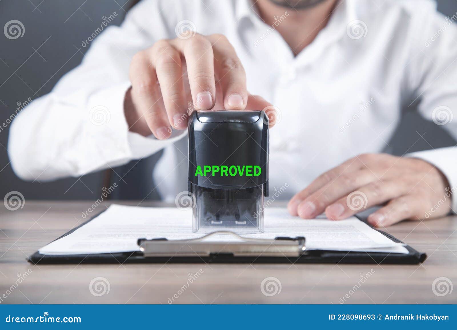 Man Stamping Approved Stamp on Document Stock Image - Image of paper ...