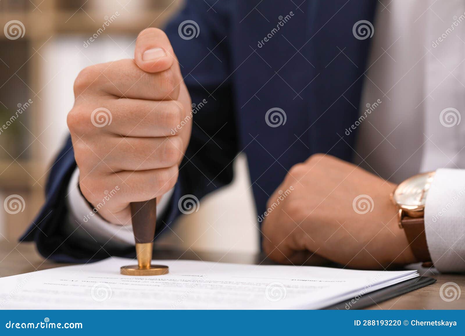 Man Stamping Document at Table, Closeup View Stock Photo - Image of ...