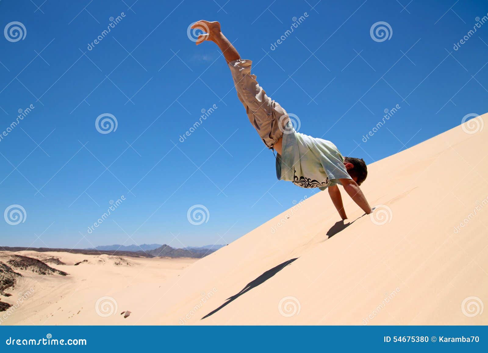 Man in standhand stock photo. Image of sand, emotions - 54675380