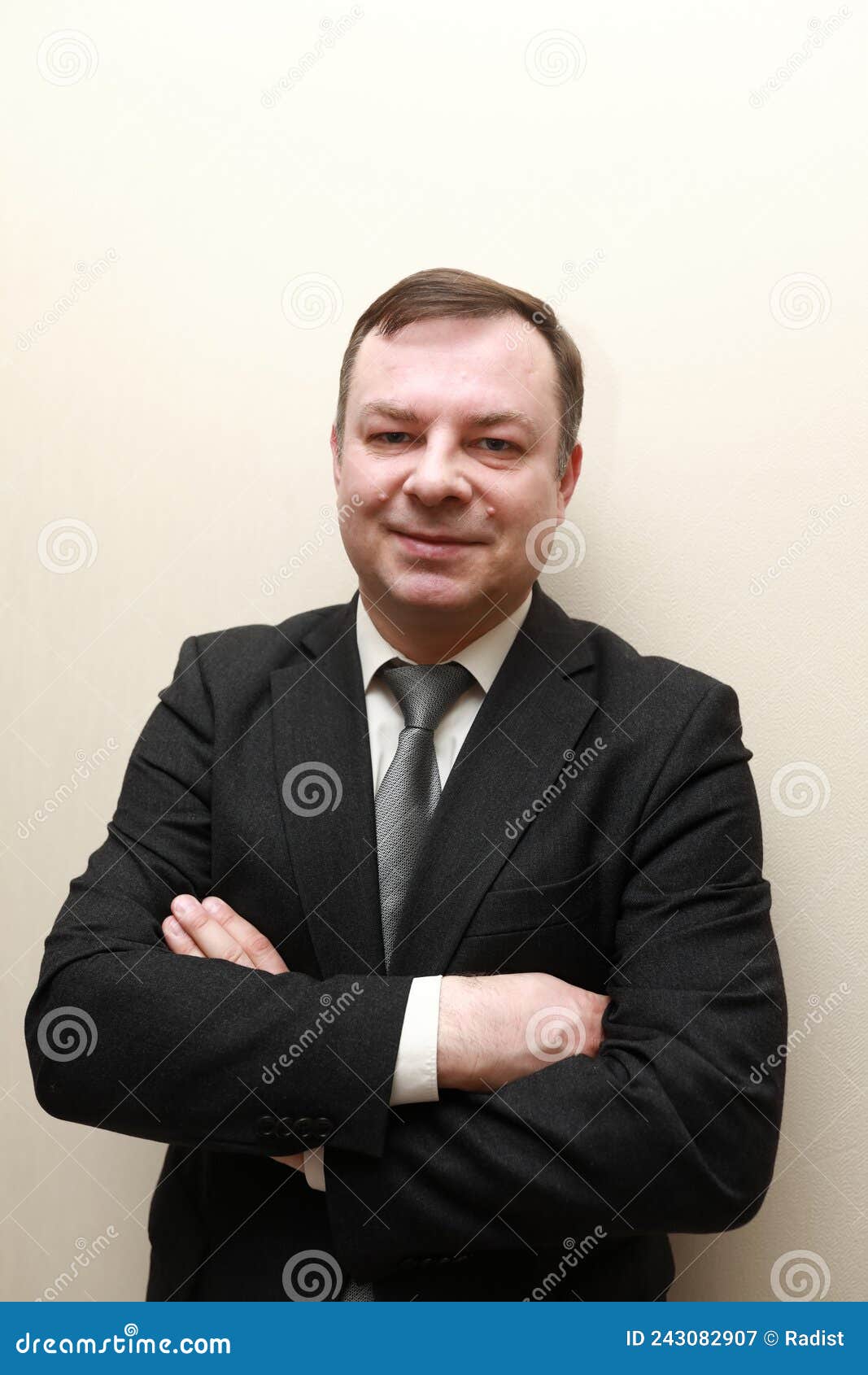 Man Standing Against the Wall Stock Image - Image of lifestyle, indoor ...