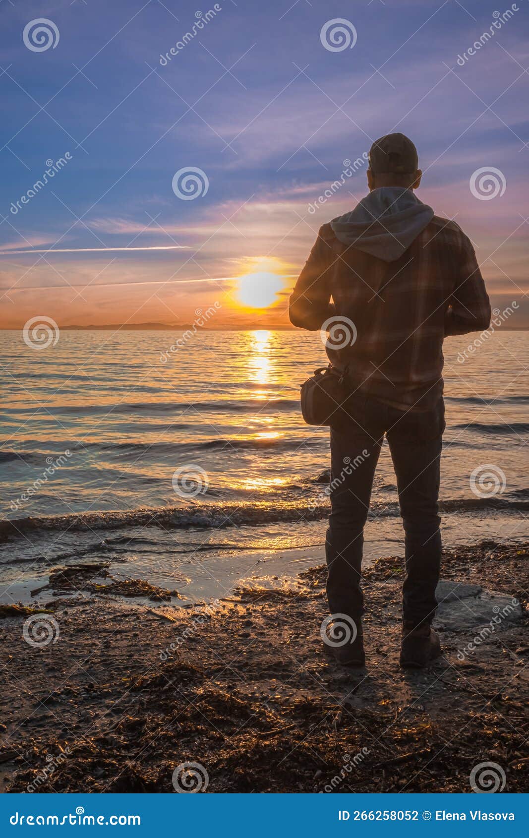 Man Standing Backlight Sunset Lighting Back View at Evening Beach in a ...